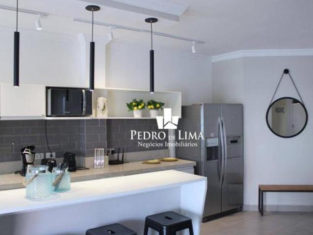 Apartamento com 2 dormitórios à venda, 82 m² por R$ 2.450.000,00 Riviera Módulo 6 Bertioga/SP