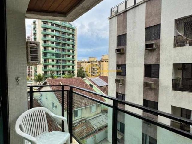 Apartamento com 2 dormitórios à venda, 91 m² por R$ 415.000,00 Astúrias Guarujá/SP