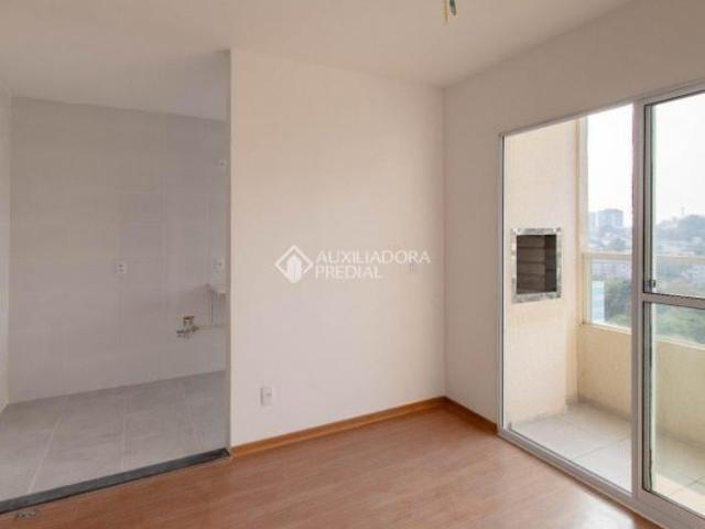 Apartamento com 2 dormitórios, churrasqueira e vaga