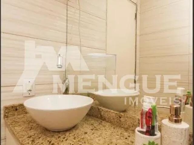 Apartamento com 2 dormitórios com vaga escriturada, coberta à venda no bairro Jardim Salso em Porto