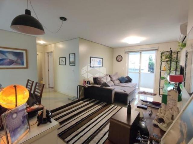 Apartamento com 2 dormitórios de 86m² e 2 vagas de garagem localizado no bairro Cinquentenário