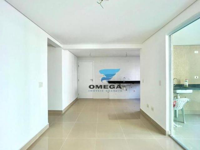 Apartamento com 2 dormitórios e ampla sacada gourmet à venda na Praia das pitangueiras Guarujá/SP