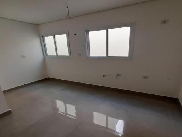 Apartamento com 2 dormitórios e com 1 vaga de garagem