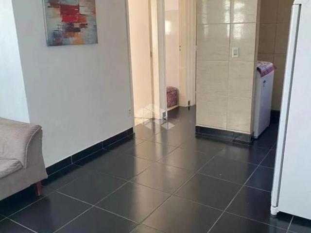 Apartamento com 2 dormitórios e vaga de garagem, no bairro Glória, em Porto Alegre