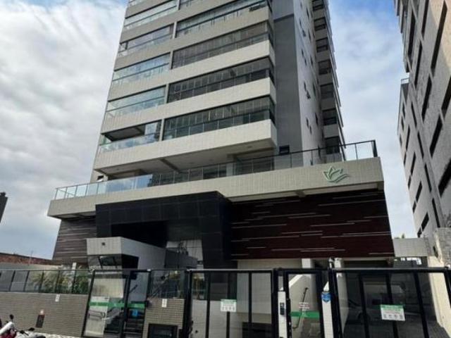 Apartamento com 2 dormitórios e vista lateral para o mar em Praia Grande SP