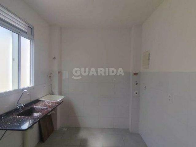 Apartamento com 2 dormitórios e 1 vaga de garagem, no bairro Restinga COD: 20434