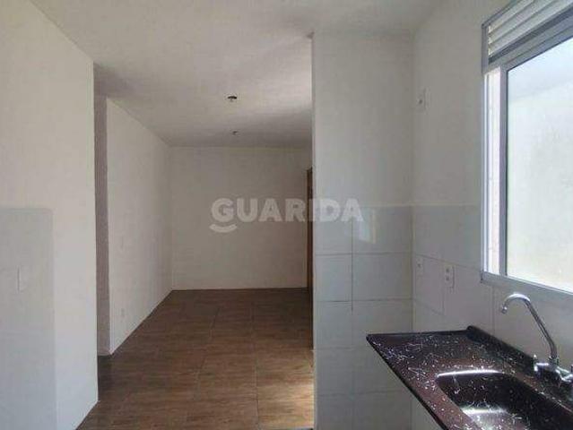 Apartamento com 2 dormitórios e 1 vaga de garagem, no bairro Restinga COD: 20434