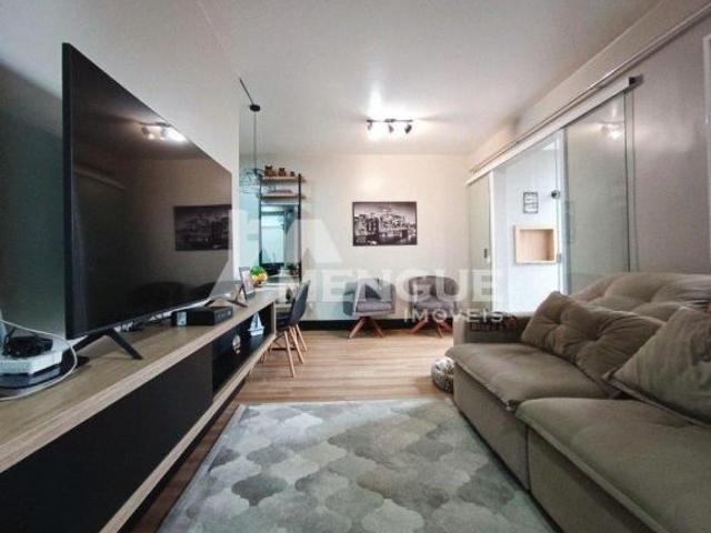 Apartamento com 2 dormitórios e 1 vaga em condomínio no bairro Humaitá em Porto Alegre com 57,93m² p