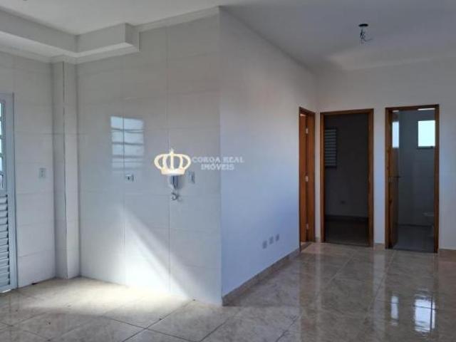 APARTAMENTO COM 2 DORMITÓRIOS, ELEVADOR E UM AMPLO QUINTAL