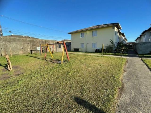 Apartamento com 2 dormitórios em rua calçada, aceitando financiamento bancário