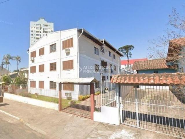 Apartamento com 2 dormitórios, garagem coberta no Bairro Padre Reus