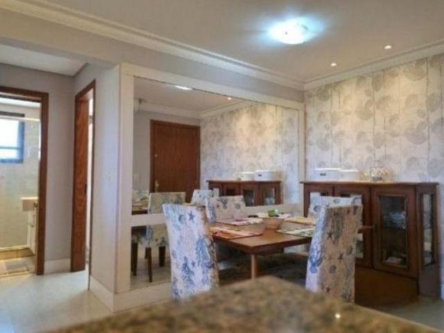 Apartamento com 2 dormitórios, lavabo, banho social e churrasqueira integrada
