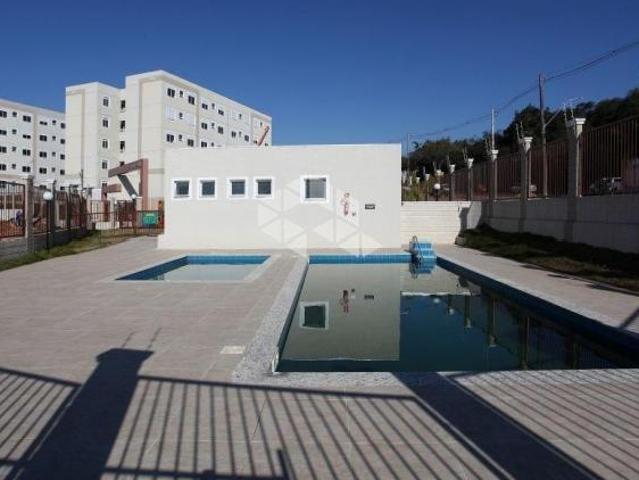 Apartamento com 2 dormitórios muito bem localizado na Av. Protásio Alves com tod