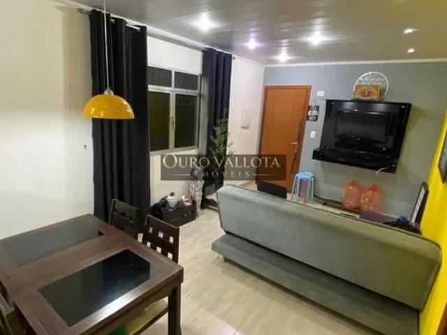 APARTAMENTO COM 2 DORMITÓRIOS NA PRAIA GRANDE, HÁ 20 MINUTOS ANDANDO DA PRAIA