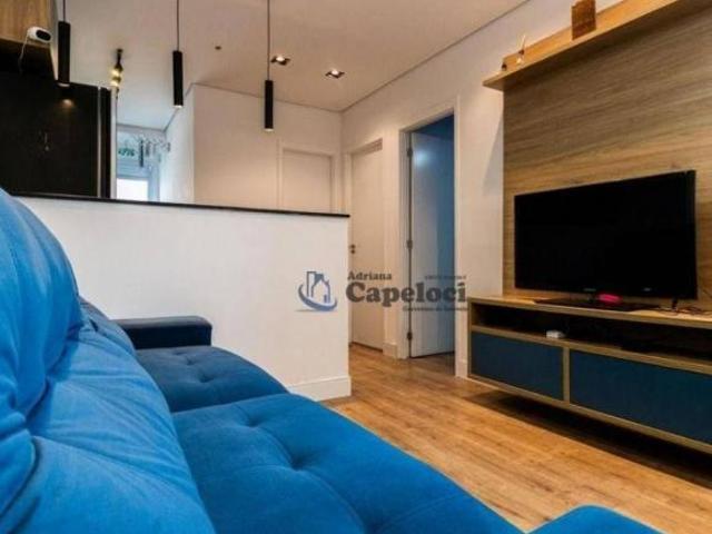 APARTAMENTO COM 2 DORMITÓRIOS NO CONDOMÍNIO HM SMART, NO GUARUJÁ