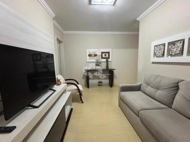 Apartamento com 2 dormitórios,sala,cozinha e aréa de serviço separada e garagem,lugar tranquilo p