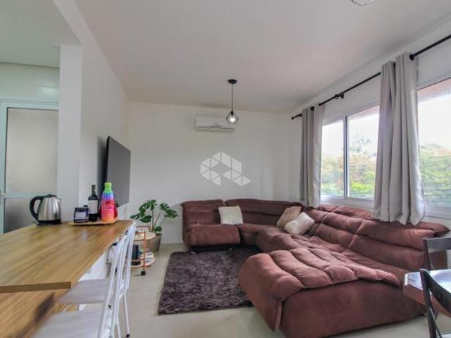 Apartamento com 2 dormitórios, sendo 1 suíte e 1 vaga no bairro Jardim Botânico