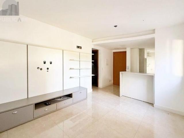 Apartamento com 2 dormitórios, sendo 1 suíte, e sala ampla com ambientes integra