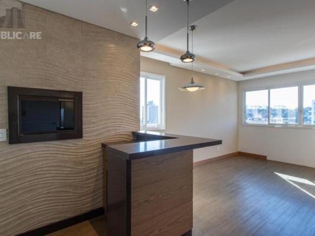 Apartamento com 2 dormitórios, sendo 1 suíte, e sala ampla com ambientes integra