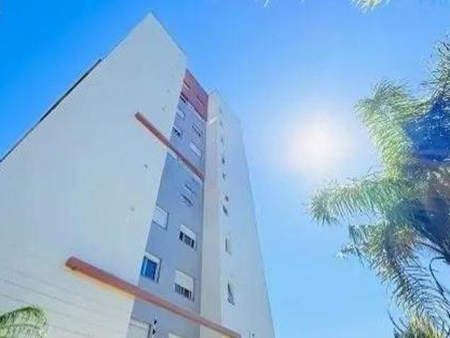 Apartamento com 2 dormitórios, sendo 1 suíte, e sala ampla com ambientes integrados Condomínio Res