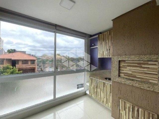 Apartamento com 2 dormitórios, sendo 1 suite, vaga de garagem dupla, semimobiliado. Nossa Senhora da