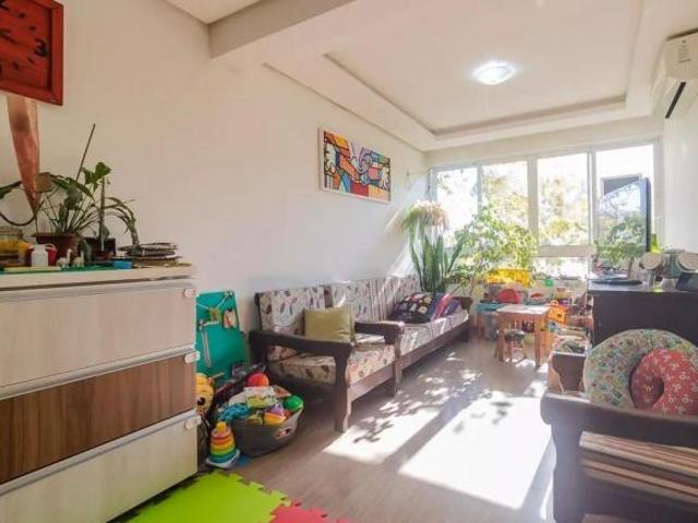 Apartamento com 2 dormitórios, suíte e churrasqueira