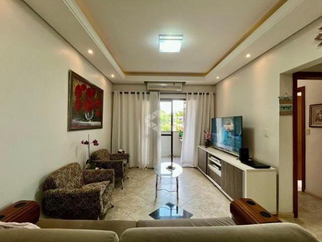 Apartamento com 2 dormitórios / suíte/ sacada com churrasqueira e vaga coberta