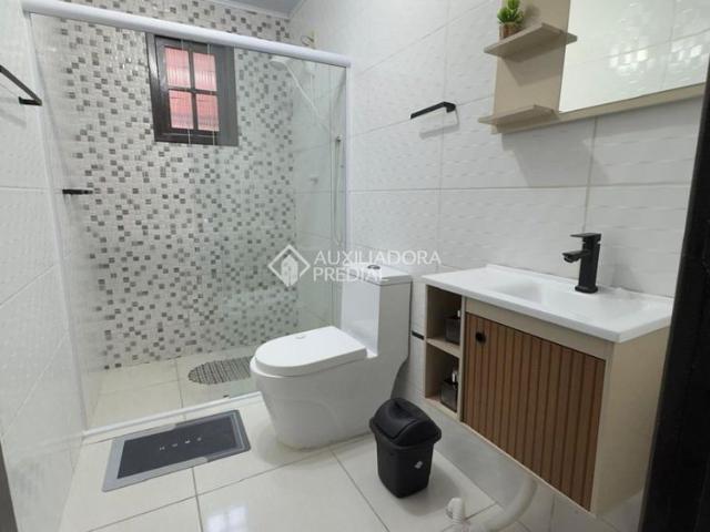 Apartamento com 2 quartos e 54m² para alugar em Praia da Ribanceira, Imbituba