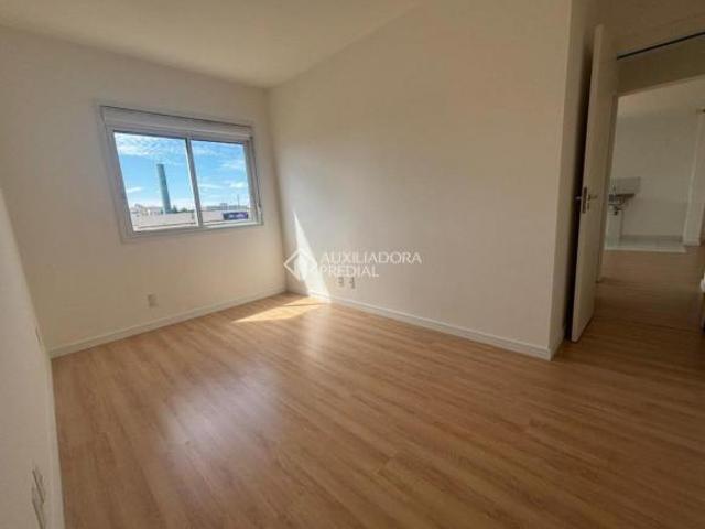 Apartamento com 2 quartos e suíte no bairro Humaitá