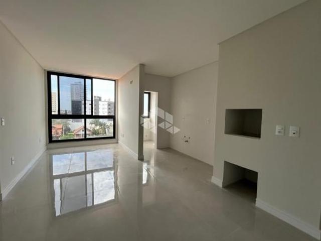 Apartamento com 2 quartos e uma vaga de garagem em Tramandaí