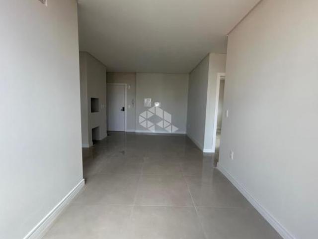 Apartamento com 2 quartos e uma vaga de garagem em Tramandaí