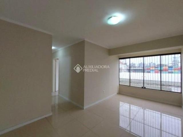 Apartamento com 2 quartos, living 2 ambientes com área de serviço separada, localizado na Avenida Ba