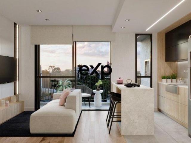 Apartamento com 2 quartos, suíte e sacada com churrasqueira no Bacacheri Curitiba