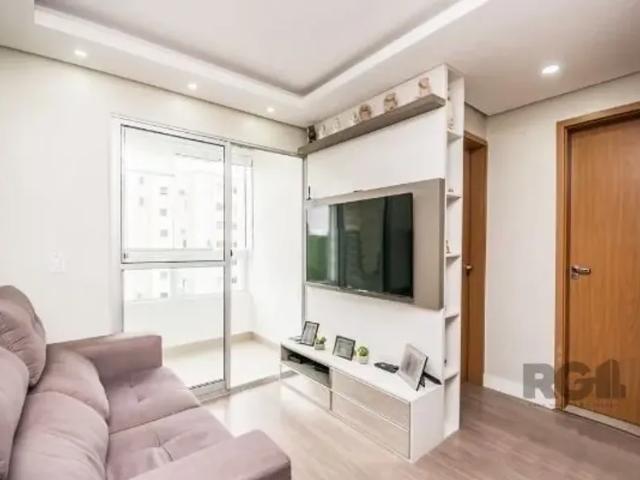 Apartamento com 2 quartos, sala, cozinha, sacada com churrasqueira e 1 vaga