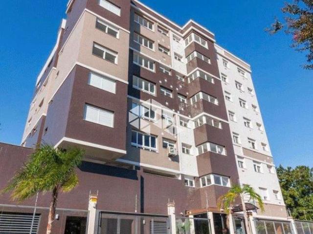 JÁ LOCADO! Com 2 quartos sendo uma suíte, 2 vagas de garagem, cozinha com churrasqueira IMOVEL