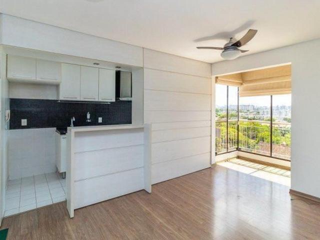 Apartamento com 2 quartos, vaga e sacada e churrasqueira no bairro Sarandi