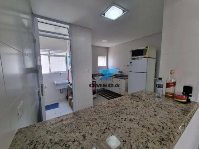 Apartamento com 2 dormitórios à venda, 90 m² por R$ 445.000,00 Pitangueiras Guarujá/SP