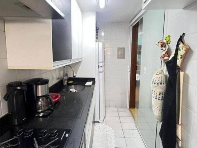 Apartamento com 2 quartos, 1 banheiro, uma vaga de garagem, térreo