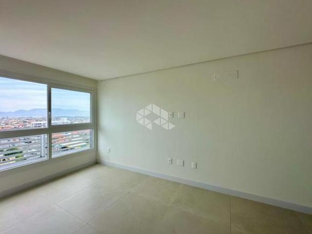 Apartamento com 2 suítes + lavabo e box/vaga de garagem nunca habitado no bairro