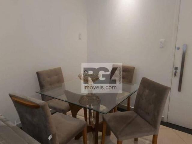 Apartamento com 4 dormitórios à venda, 110 m² por R$ 650.000,00 Ponta da Praia Santos/SP