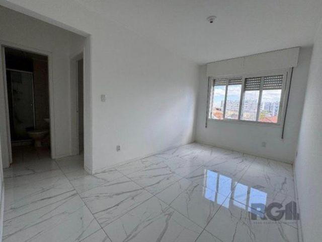 Apartamento com 54,70 m² de área privativa com dois dormitórios, sala, cozinha e área de serviço. Re