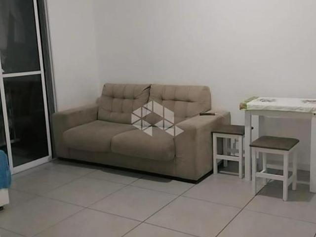 Apartamento com 55 m², 2 dormitórios, sacada com churrasqueira e 1 vaga de garagem na Cavalhada
