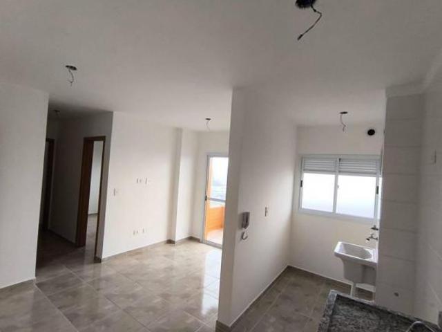 APARTAMENTO COM 57,00 m² BOQUEIRAO PRAIA GRANDE SP
