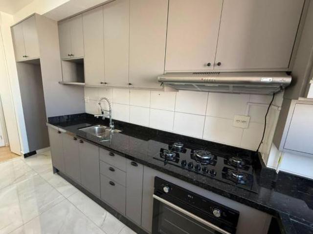 Apartamento com 65m² com três dormitórios uma suíte uma vaga com móveis planejados