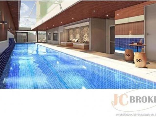 Apartamento com 78m² de área útil, 2 vagas de garagem, amplo living, varanda, 2 dormitórios