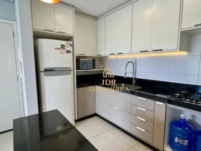 Apartamento com churrasqueira na sacada à venda no Edifício JK em Americana | 2 dormitórios | 1 suít