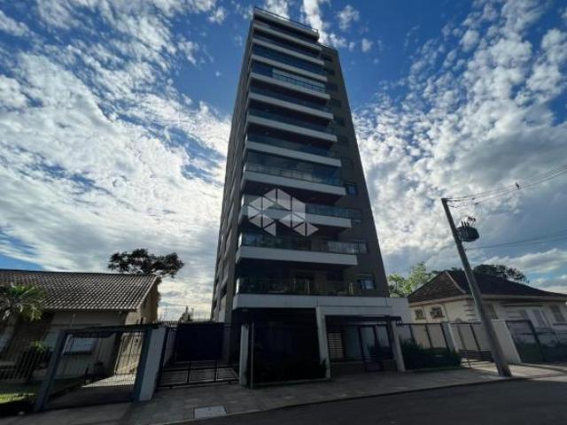 Apartamento com ampla sacada e com móveis projetados