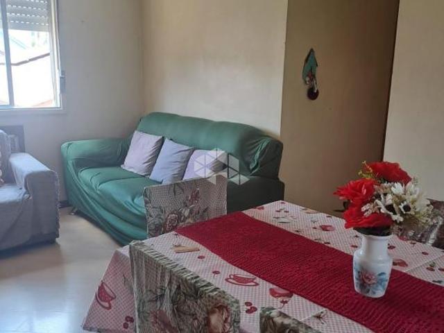 Apartamento com dois dormitórios, prédio com elevador, bairro Intercap em Porto Alegre