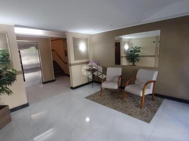 Apartamento com dois dormitórios suite dep. empregada elevador, sacada e garagem