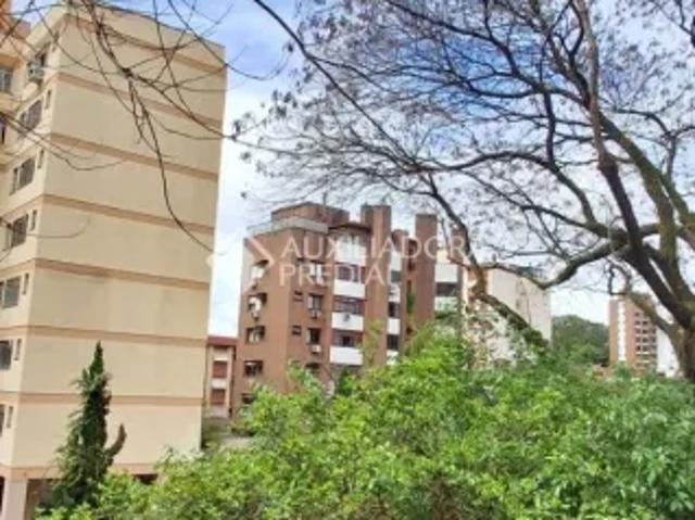 Apartamento com dois quartos, banheiro social com ventilação natural, sala para dois ambientes, cozi